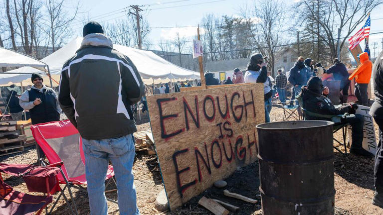 New York fires 2,000 prison guards over wildcat strike refusal to ...