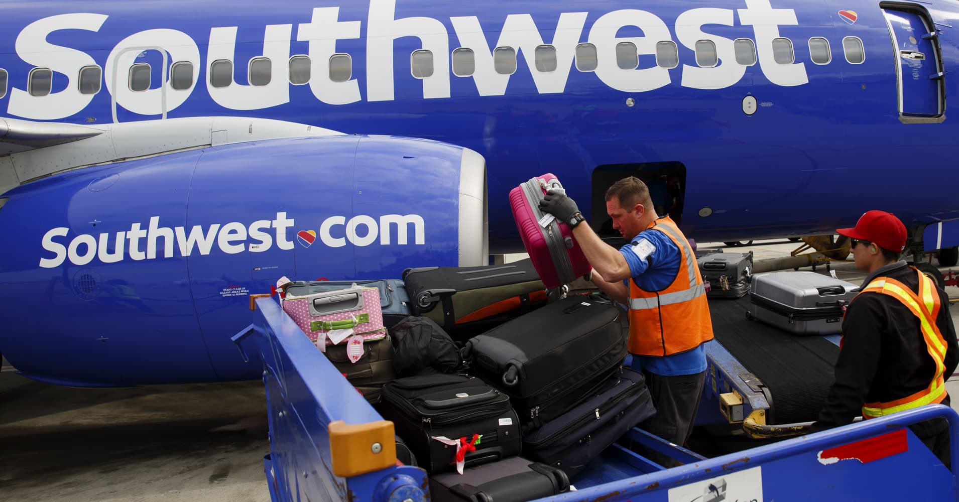 Southwest Airlines will charge to check bags for the first time, launch ...