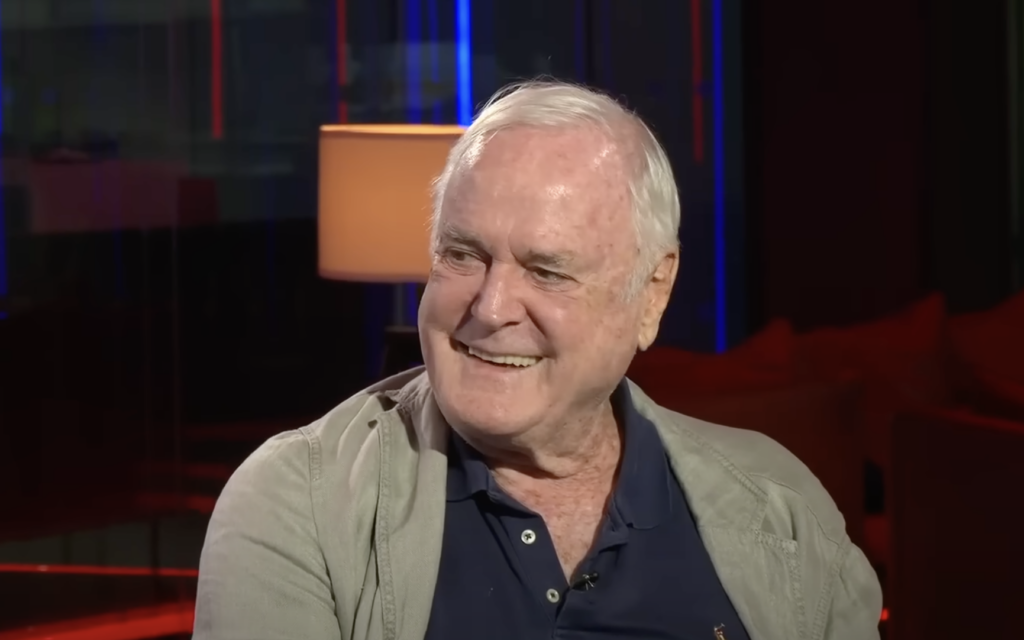 Still upright at 85, John Cleese to bring sit-down comedy to Israel