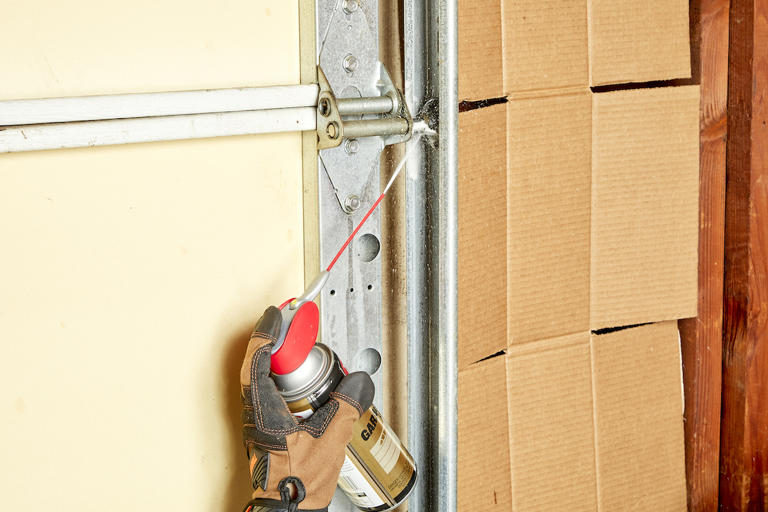 How to Lubricate a Garage Door to Keep It Operating Smoothly