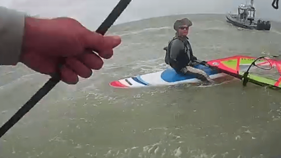 WATCH: Windsurfer swept a mile offshore by storm rescued