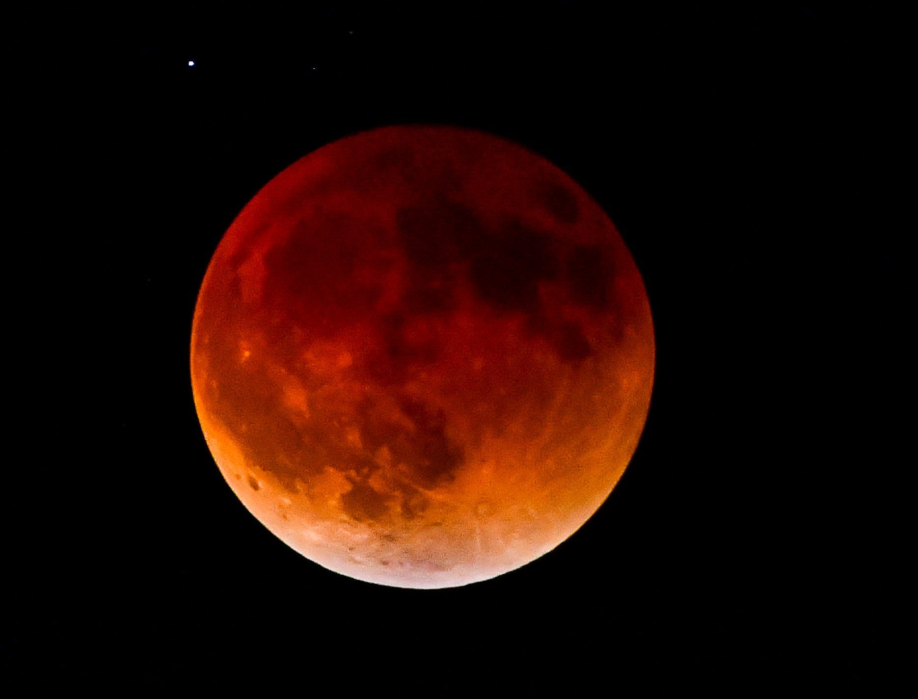 Watching tonight's lunar eclipse in Indiana. What time is the blood moon?