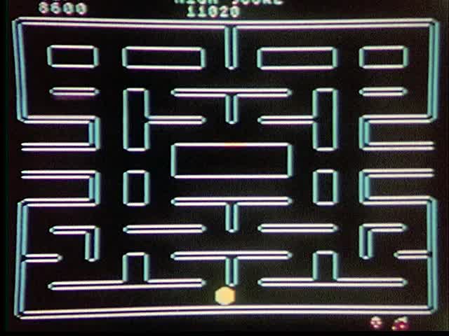Pac-Man Gameplay: Classic Two-Player Arcade Game