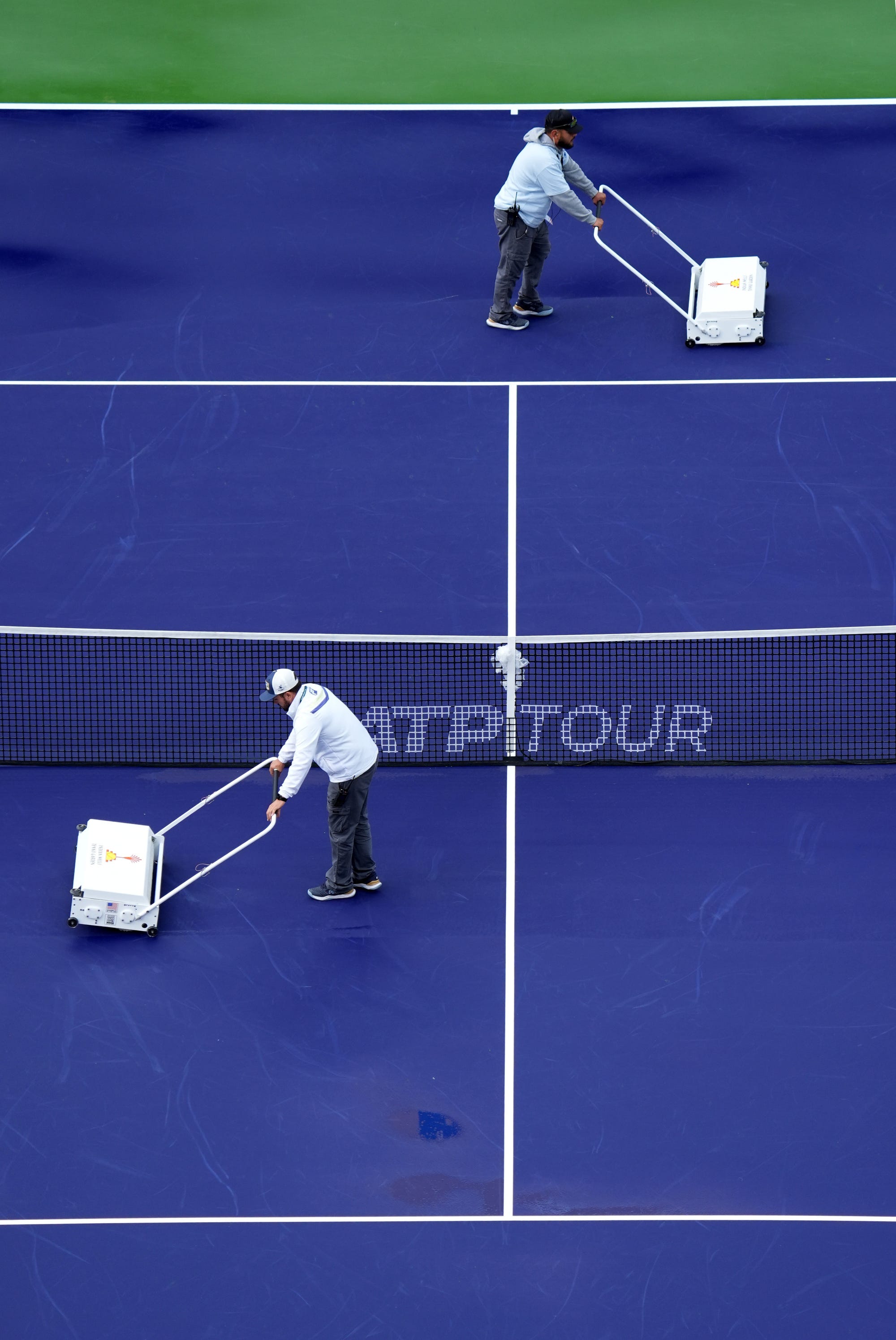Answering key questions about drying the tennis courts after rain at ...