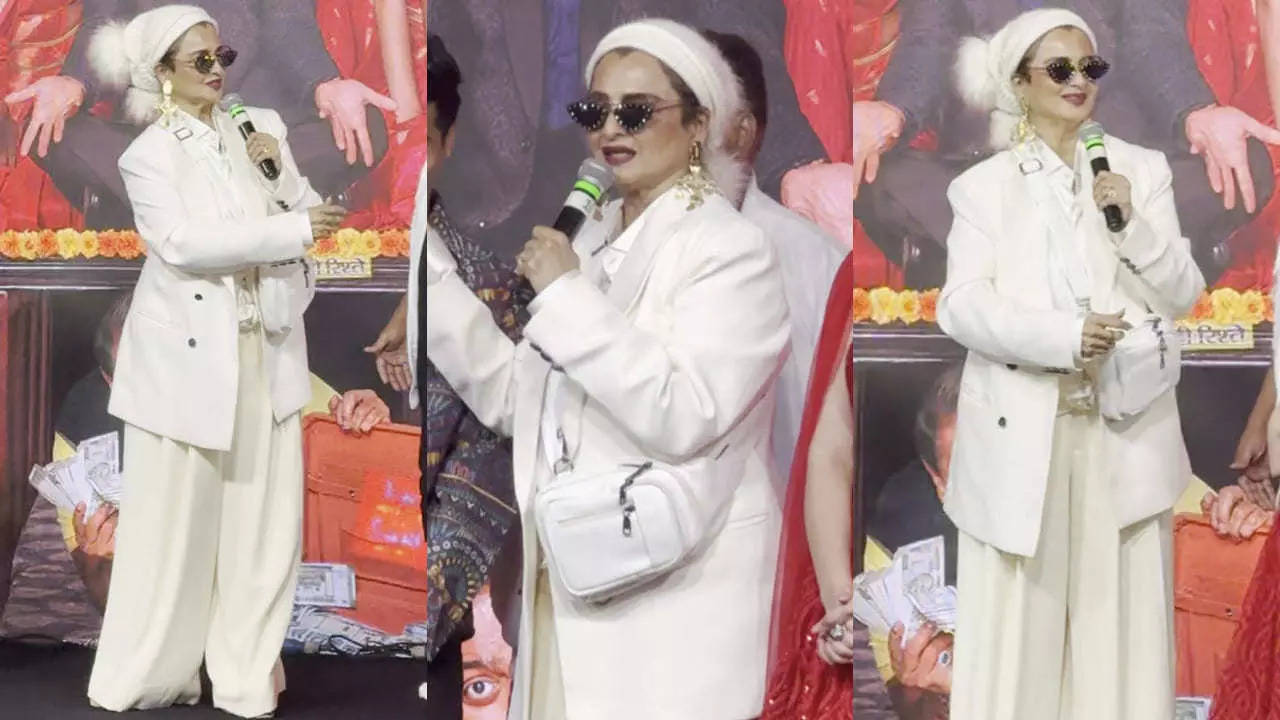 Rekha redefines power dressing in a stunning white pantsuit at trailer ...
