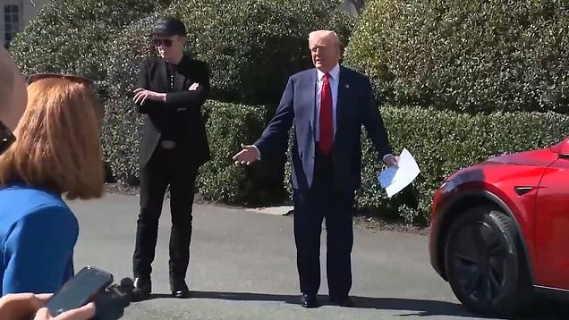 US President turns car salesman as he advertises Tesla in front of ...