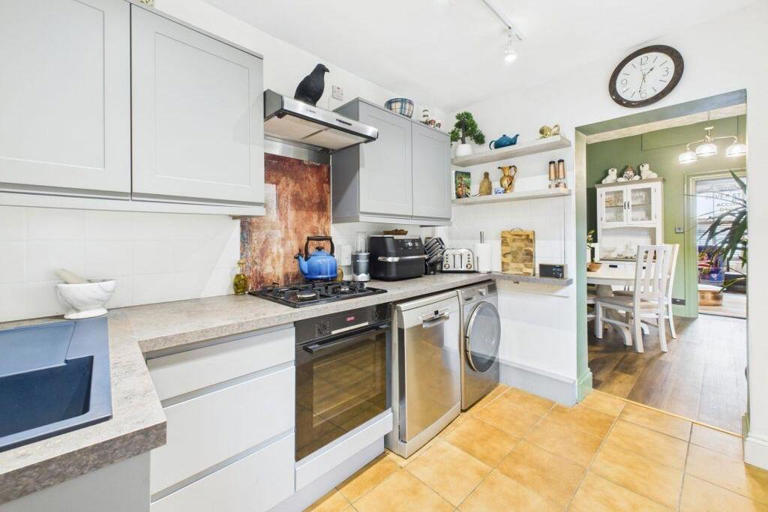 Inside this attractive, two-bed Whitby flat with modern kitchen and log ...