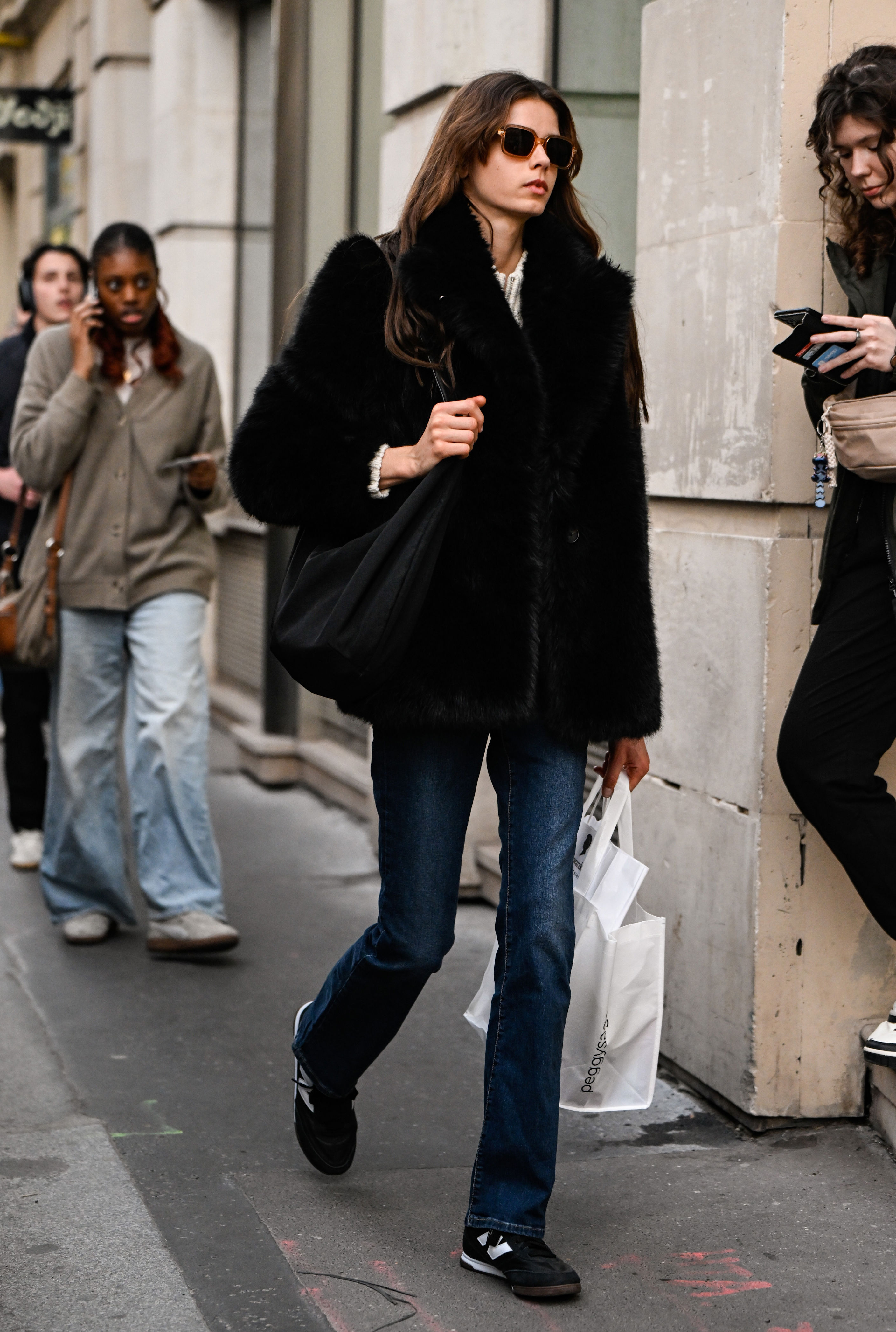 How to Wear Sneakers With Jeans, No Matter Where You're Going