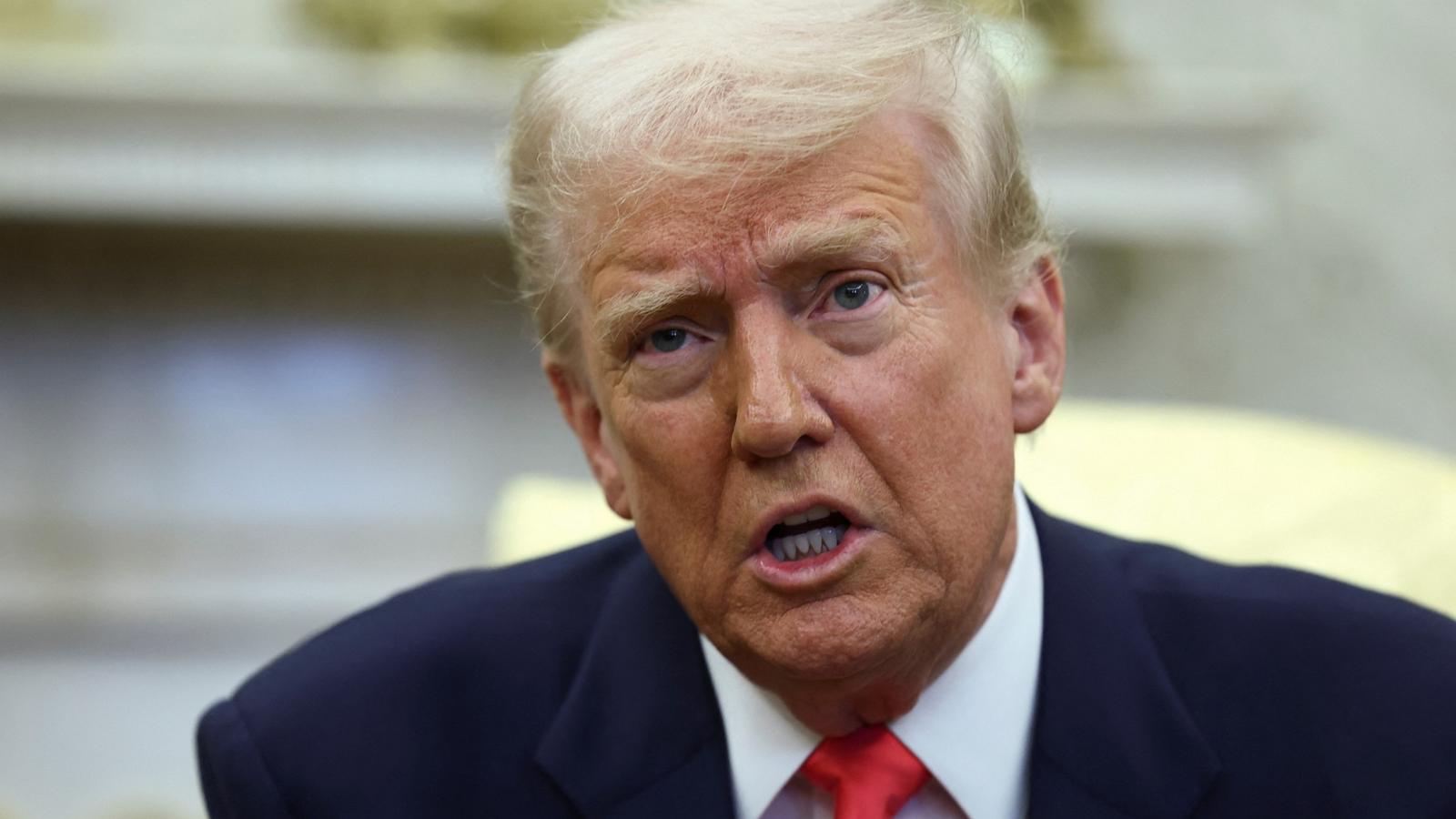 Judge blocks 'unlawful' Trump order targeting Clinton 2016 law firm