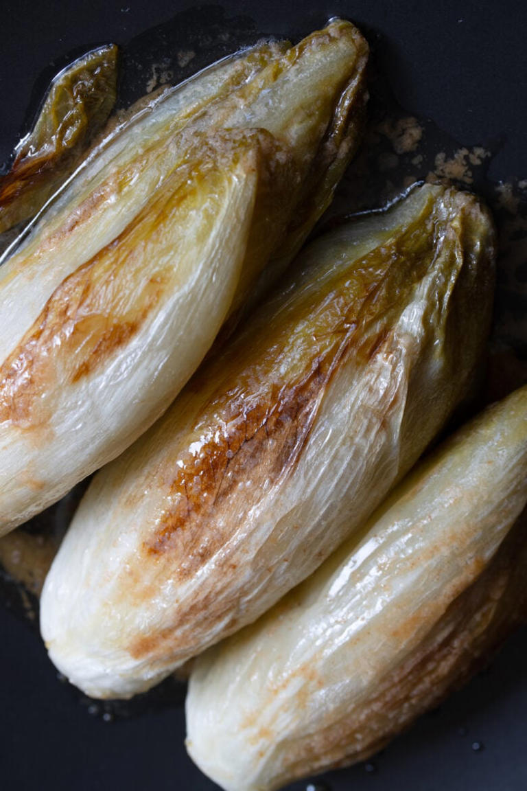 Tender braised endives