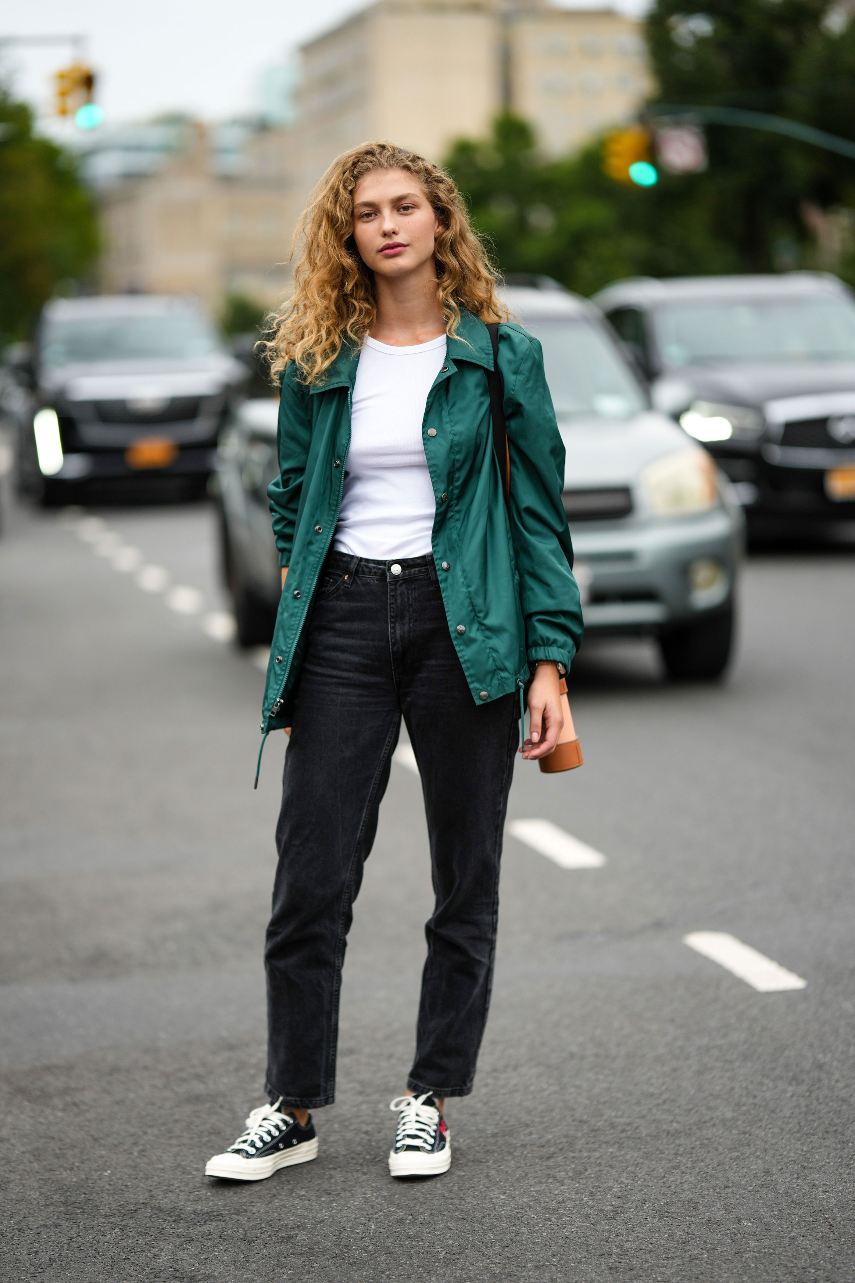 How to Wear Sneakers With Jeans, No Matter Where You're Going