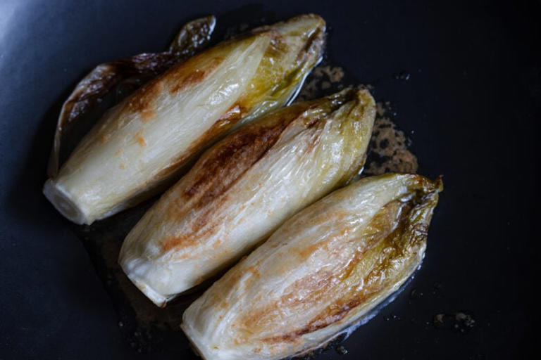Tender braised endives