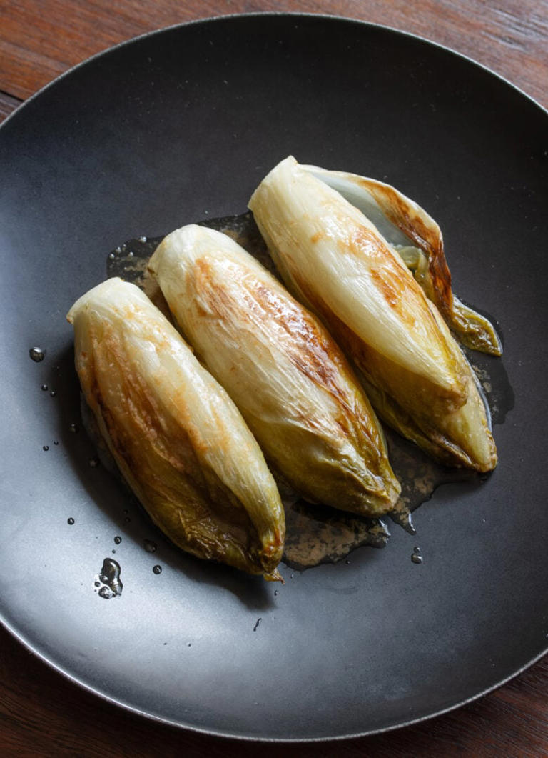 Tender braised endives