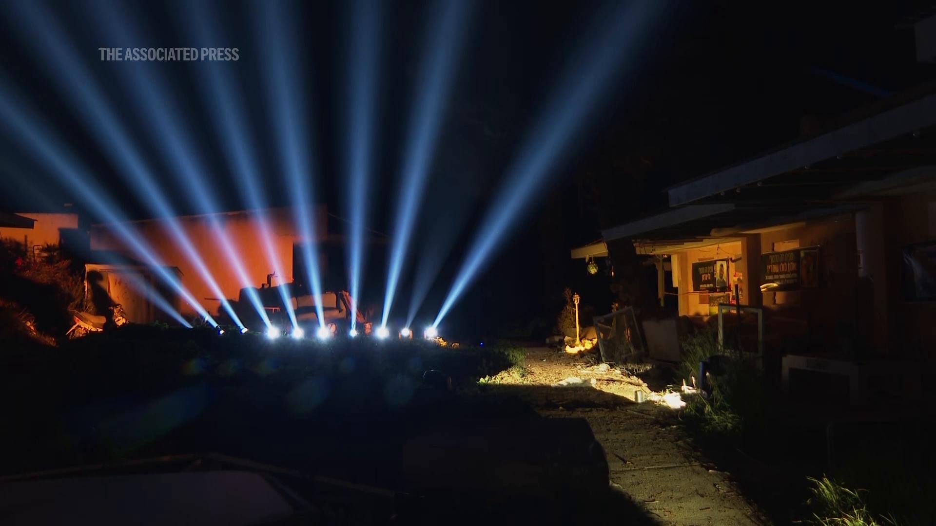 Relatives aim lights at Gaza Strip to call for release of Israeli twin ...