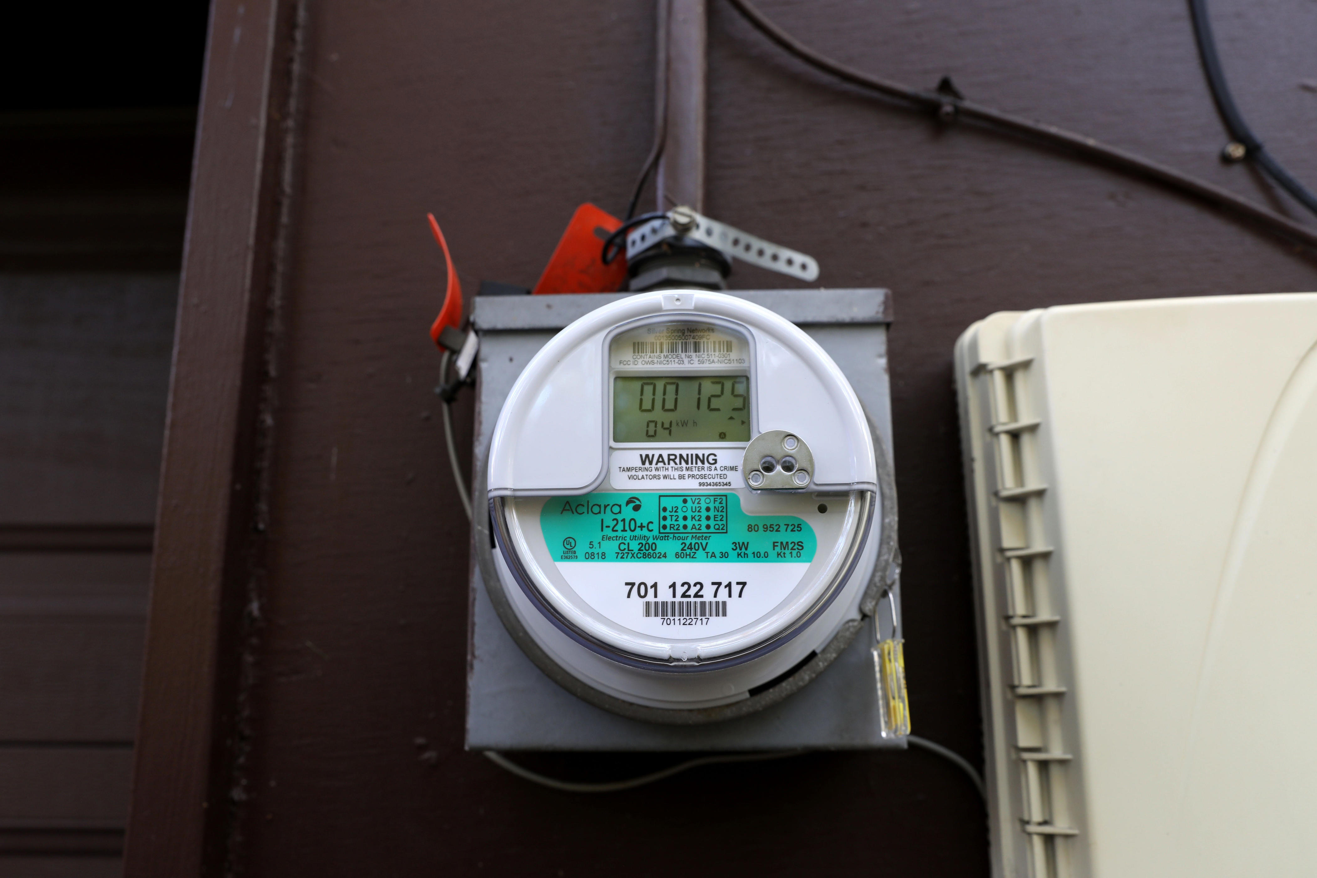 What are smart meters and how do they work, according to Con Ed and NYSEG