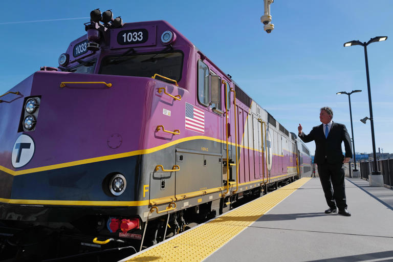 Montigny tours South Coast Rail commuter train at New Bedford station ...