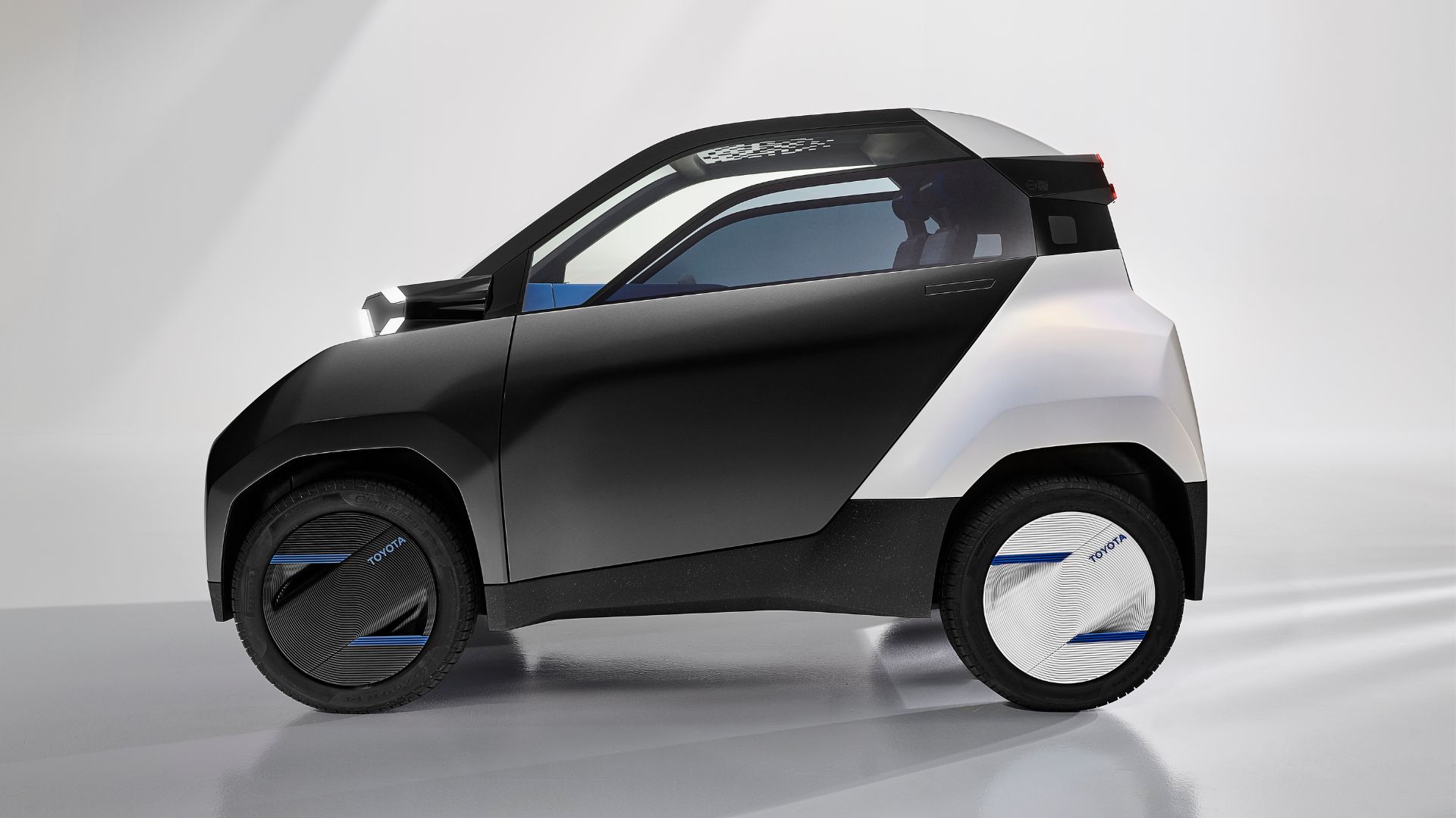 Photos: Toyota's new micro-EV features solar roof and hand-command steering