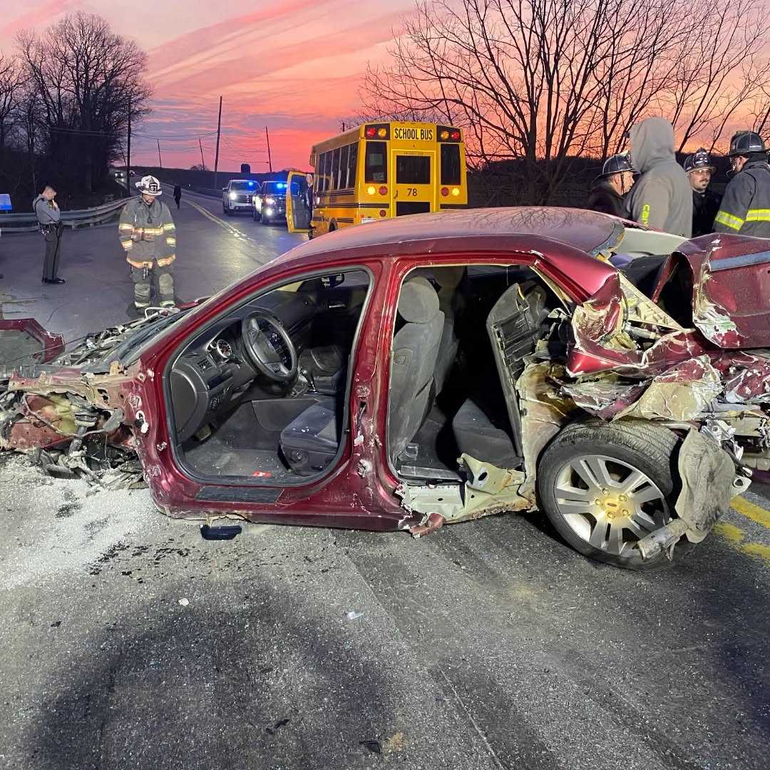 Rescue crews rip doors off demolished car to free person after crash ...