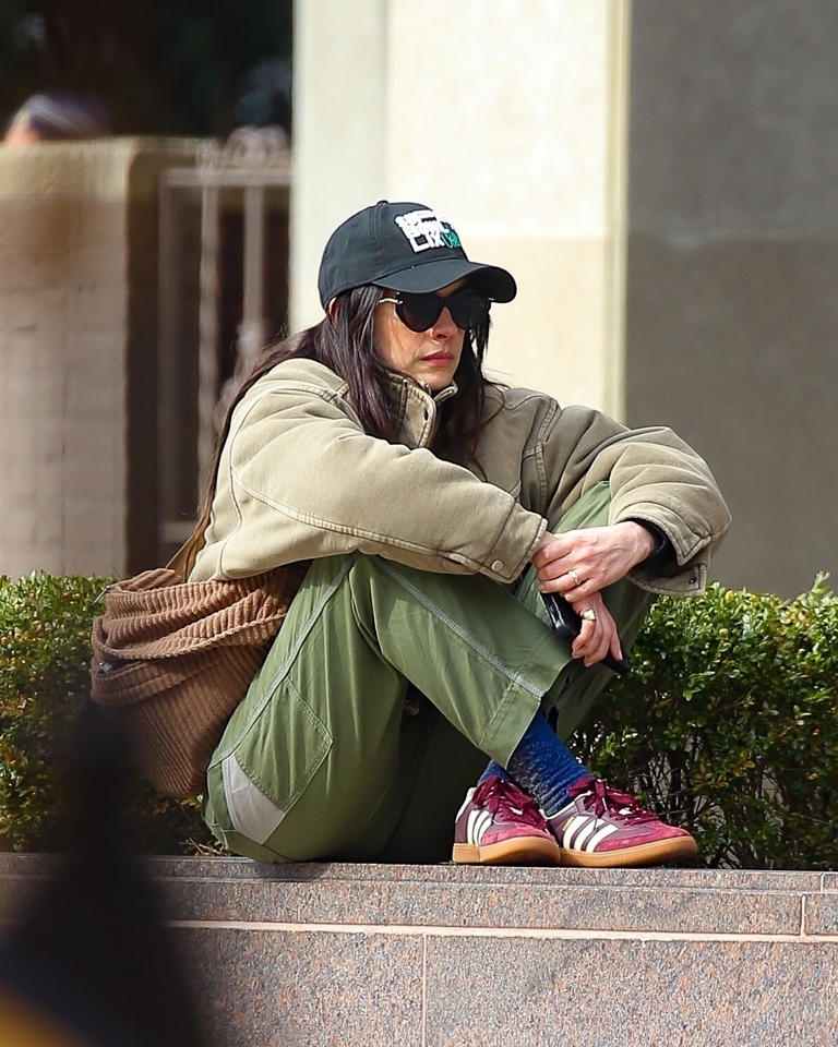 Anne Hathaway's Burgundy Adidas Sambas Expertly Translate a Winter ...