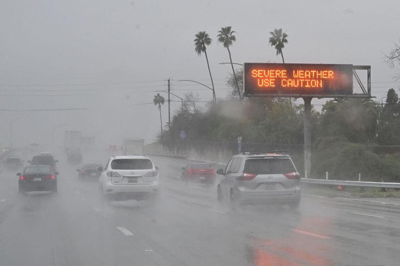 Strong storm lashes California as LA faces flooding and evacuation ...