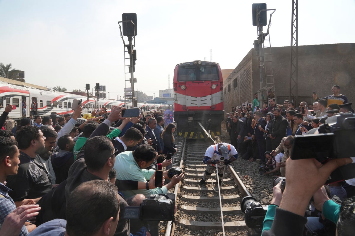He can pull a train by the strength of his teeth. An Egyptian wrestler ...