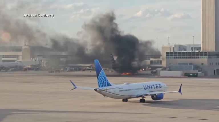 Flight from COS diverted to Denver catches fire at gate
