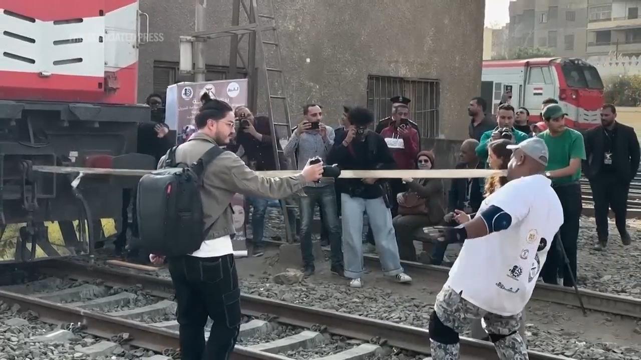 Egyptian wrestler breaks world record for pulling a train with his teeth