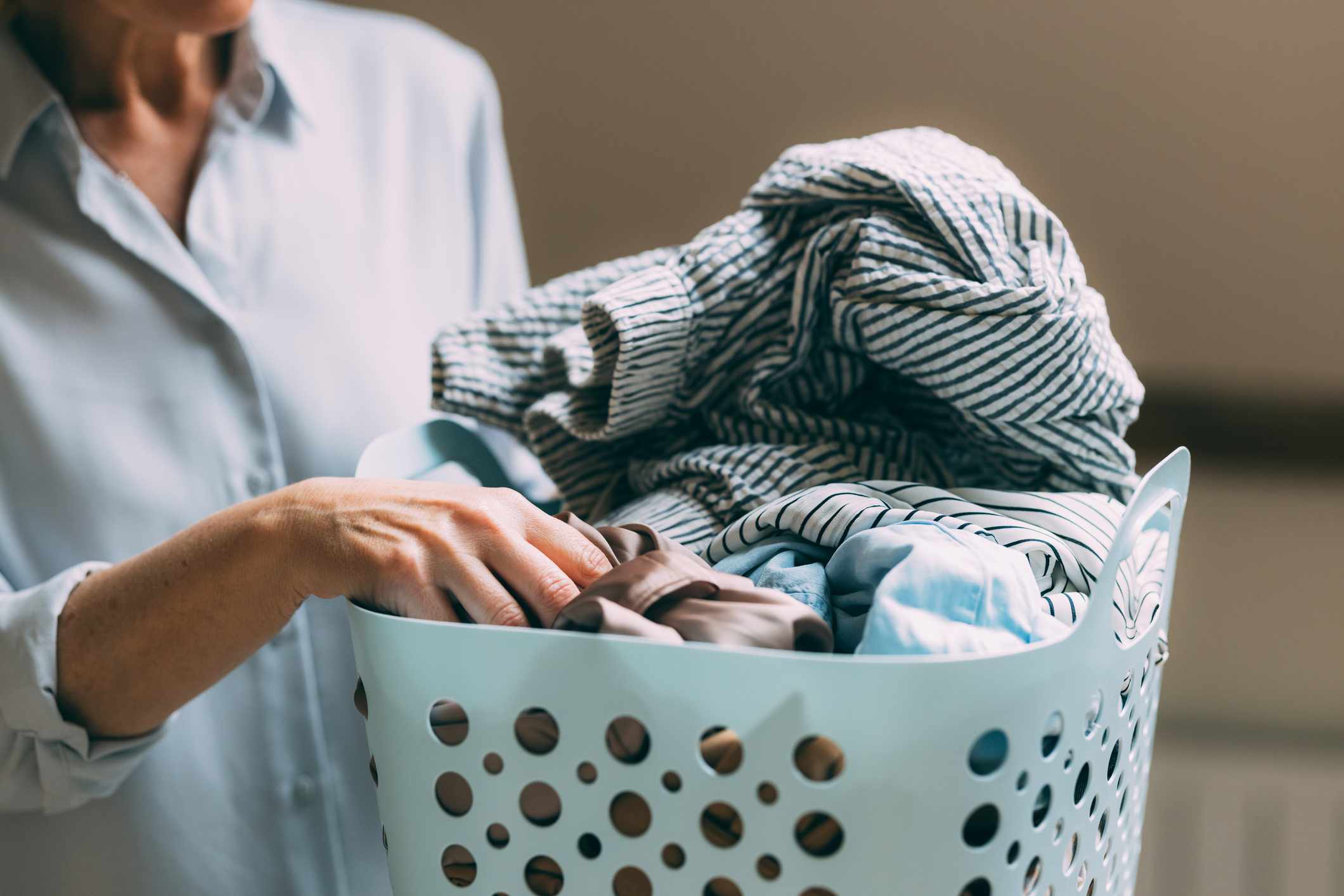 Should You Wash New Clothes Before Wearing Them? Laundry Pros Say There's a Right Answer