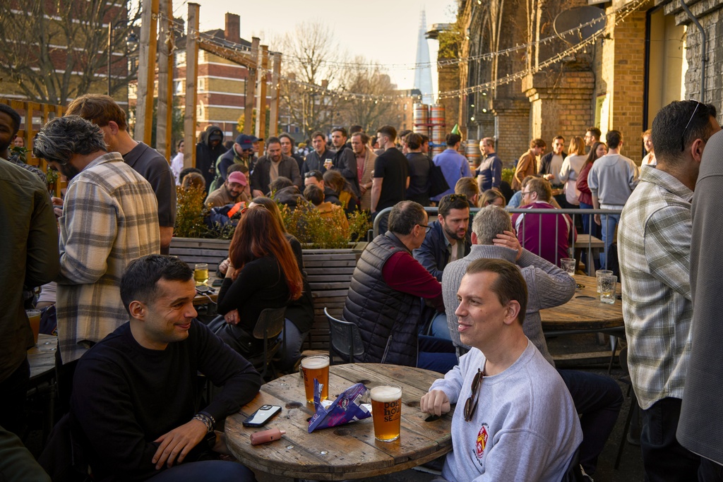 AP PHOTOS: Beer flows under south London's railway arches