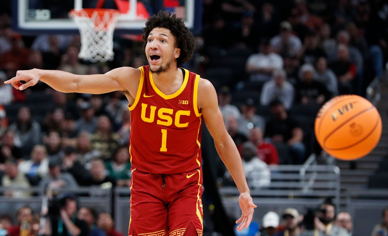 The top photos from Thursday's men's college basketball conference tournament action