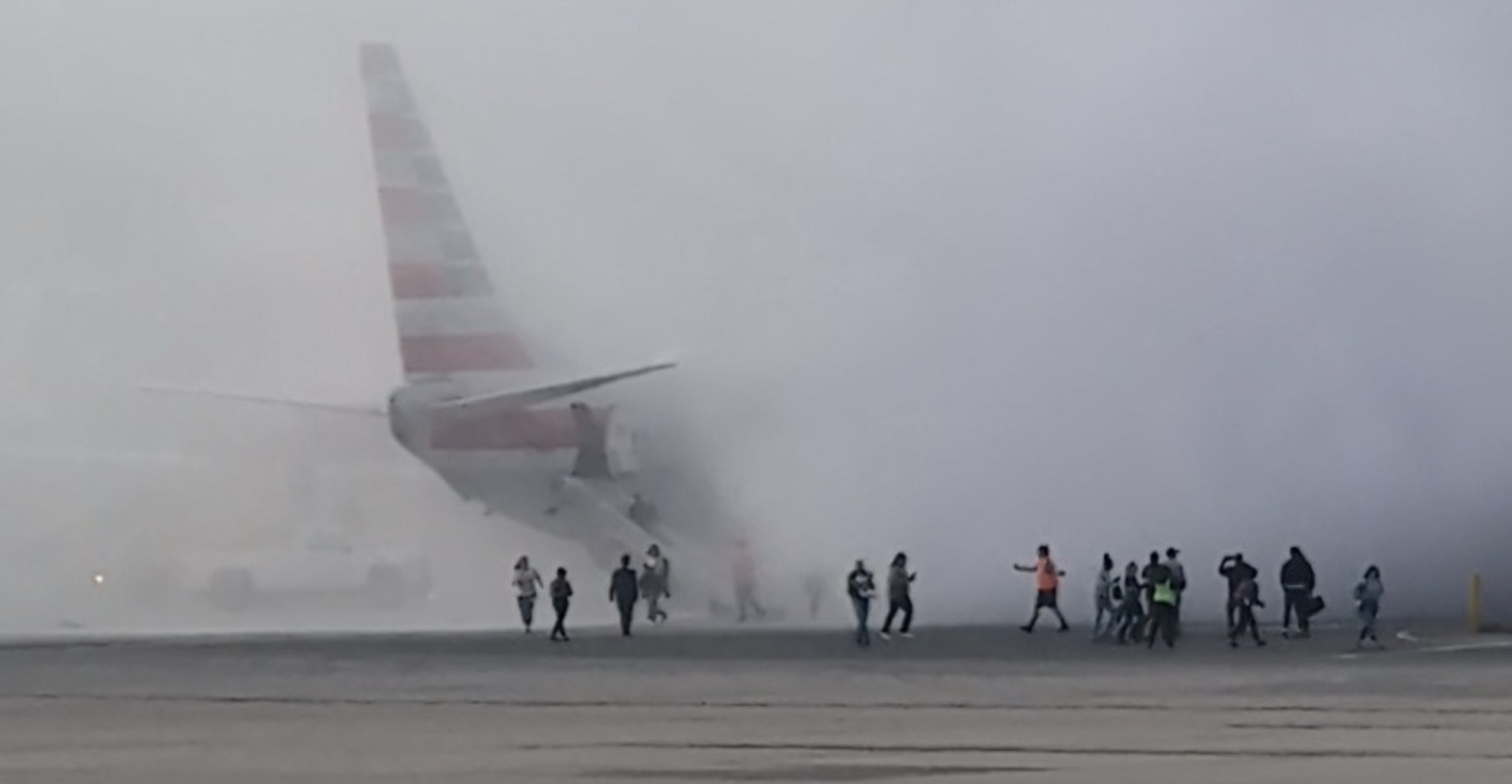 American Airlines plane evacuated after catching fire