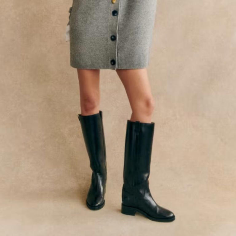 Toni Collette's impeccable style proved a white maxi dress with black ...