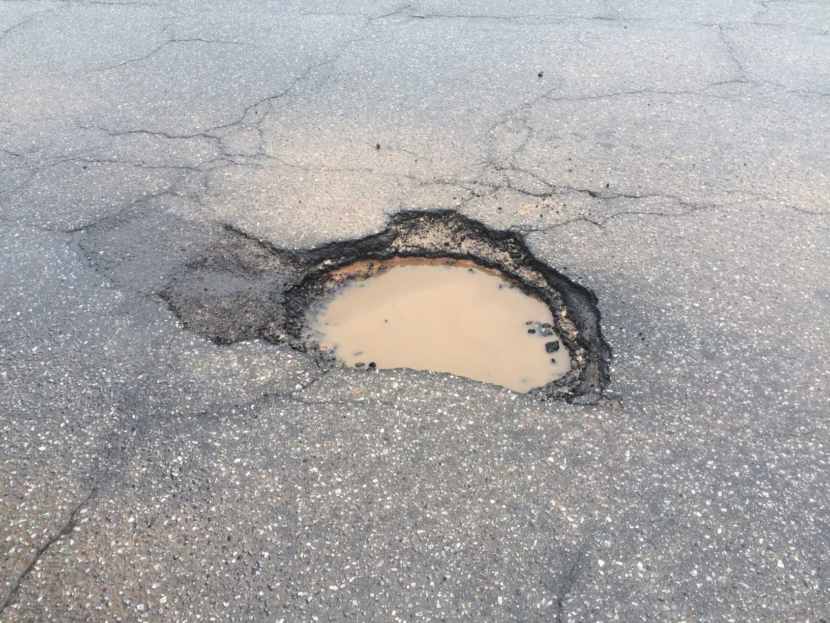 Want that pothole fixed that you drive over every day? Here's how to ...