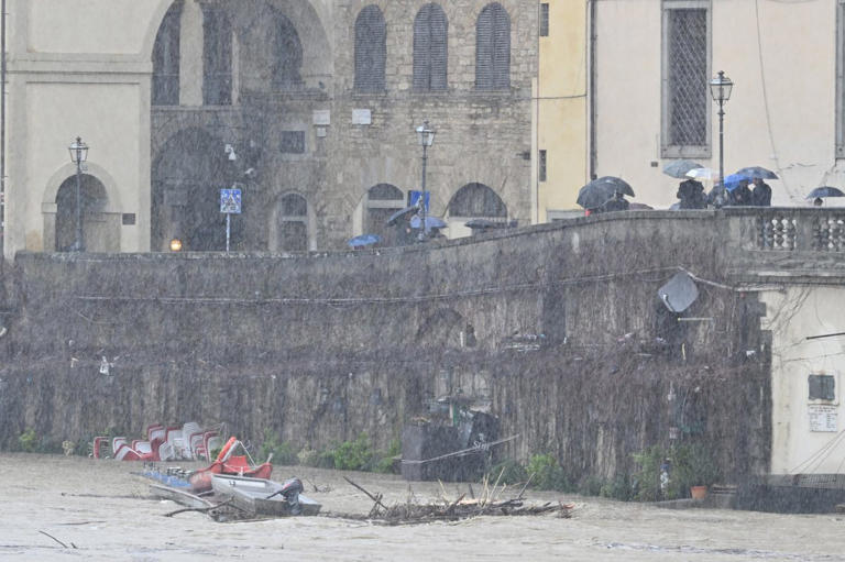 Torrential rain sparks evacuations after river bursts banks in Italy