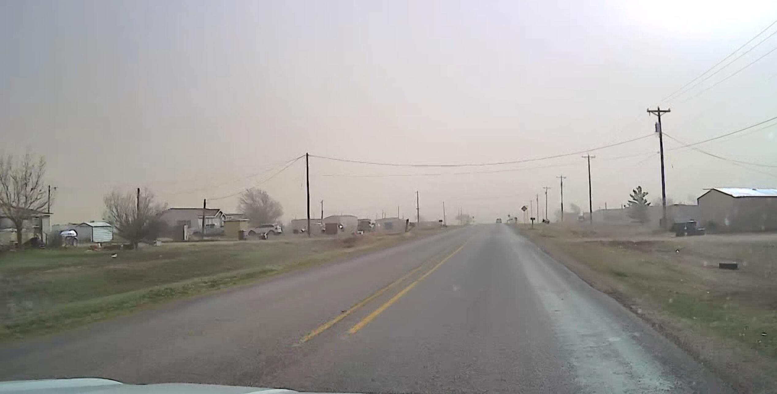 High winds cause low visibility, road closures