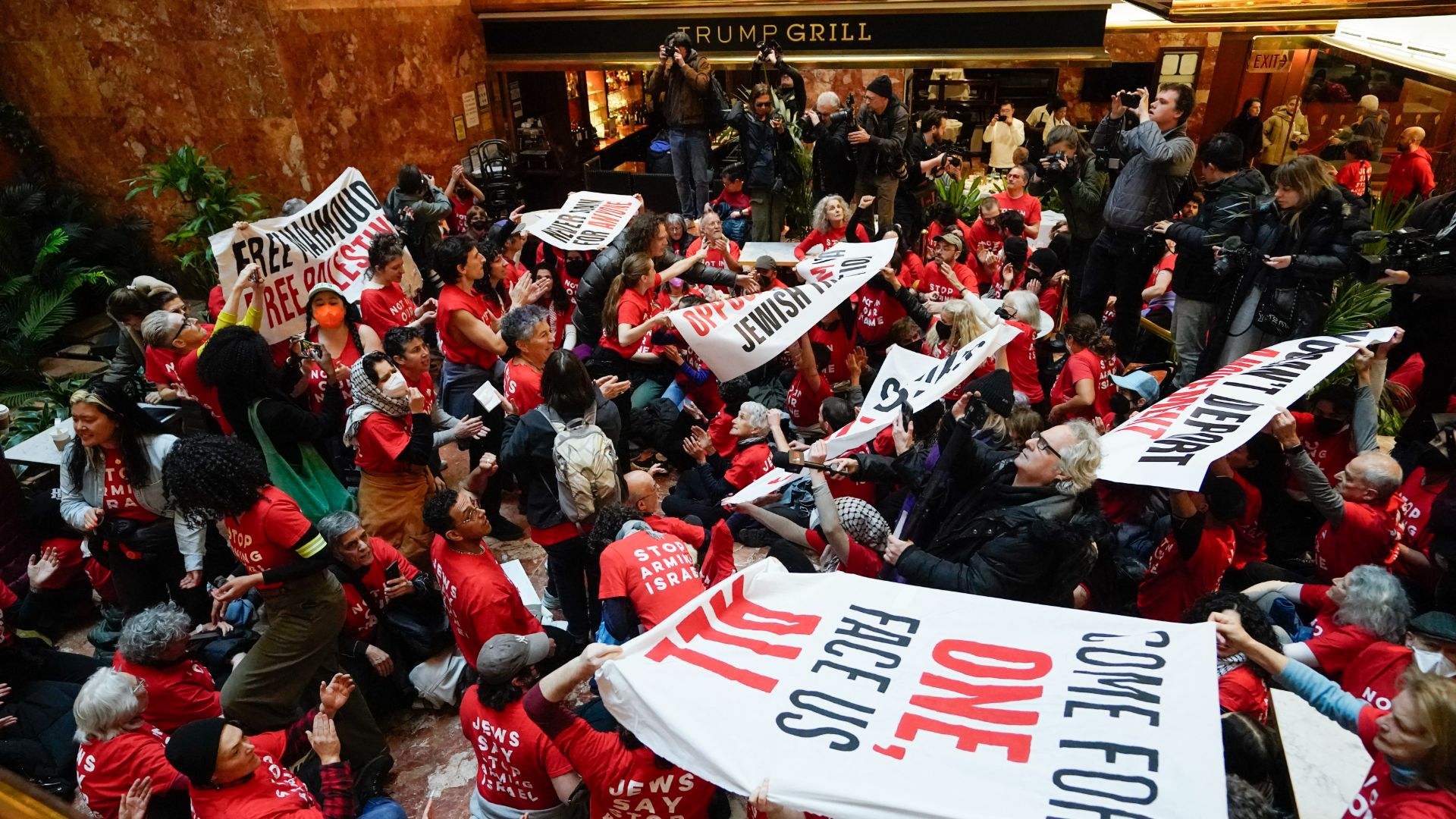 Protesters storm Trump Tower, nearly 100 arrests confirmed