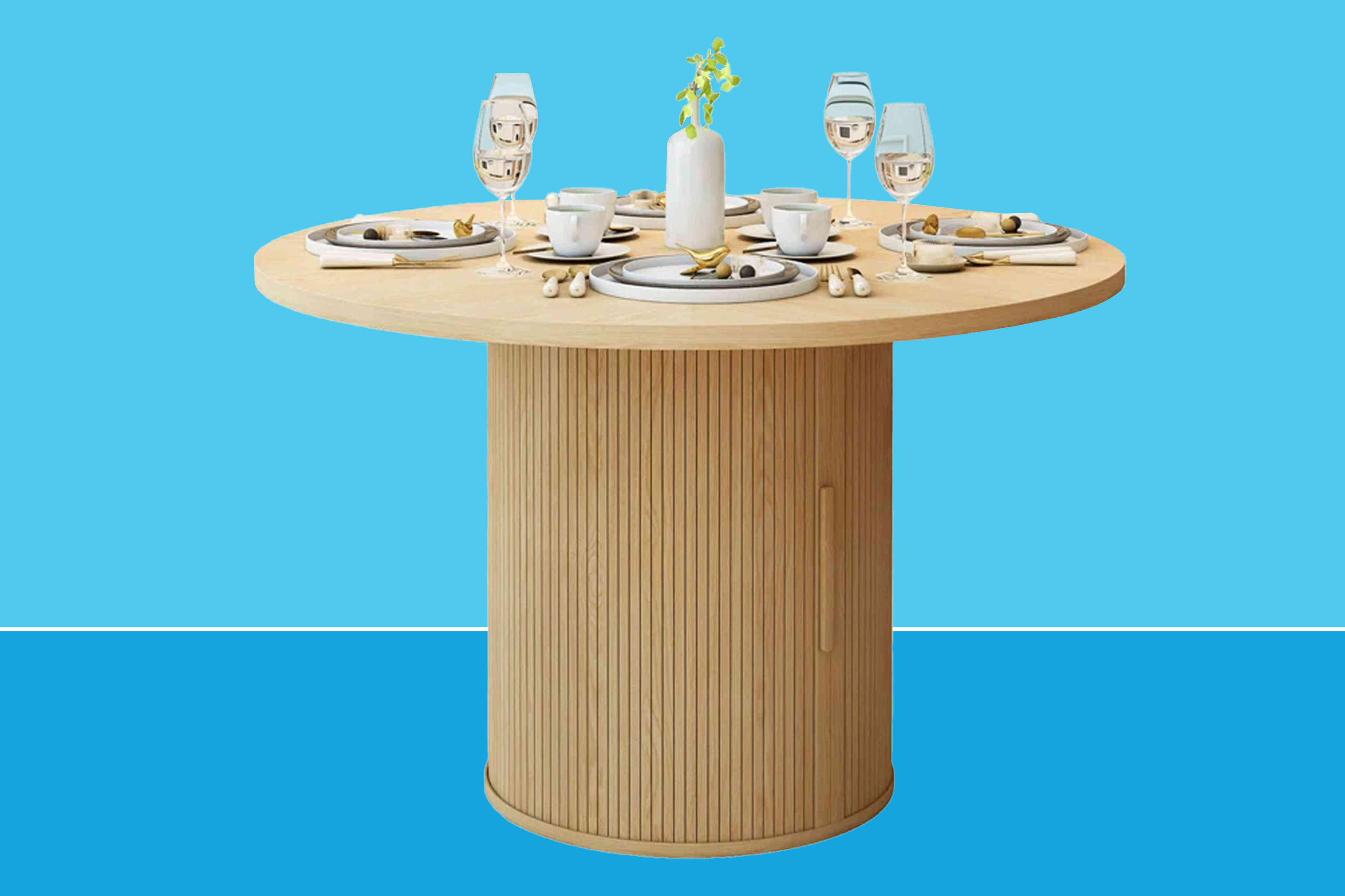 I have little kitchen cabinet space, but my dining table’s clever ...