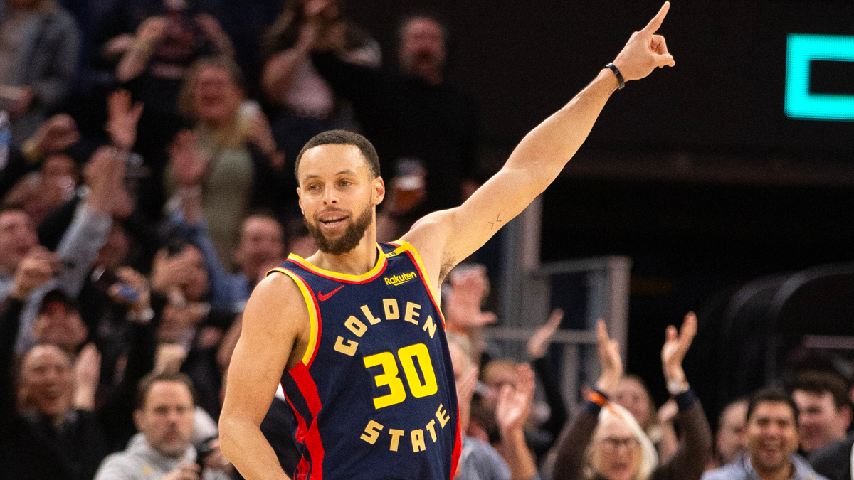 Watch Steph Curry knock down incredible half-court shot at his ...