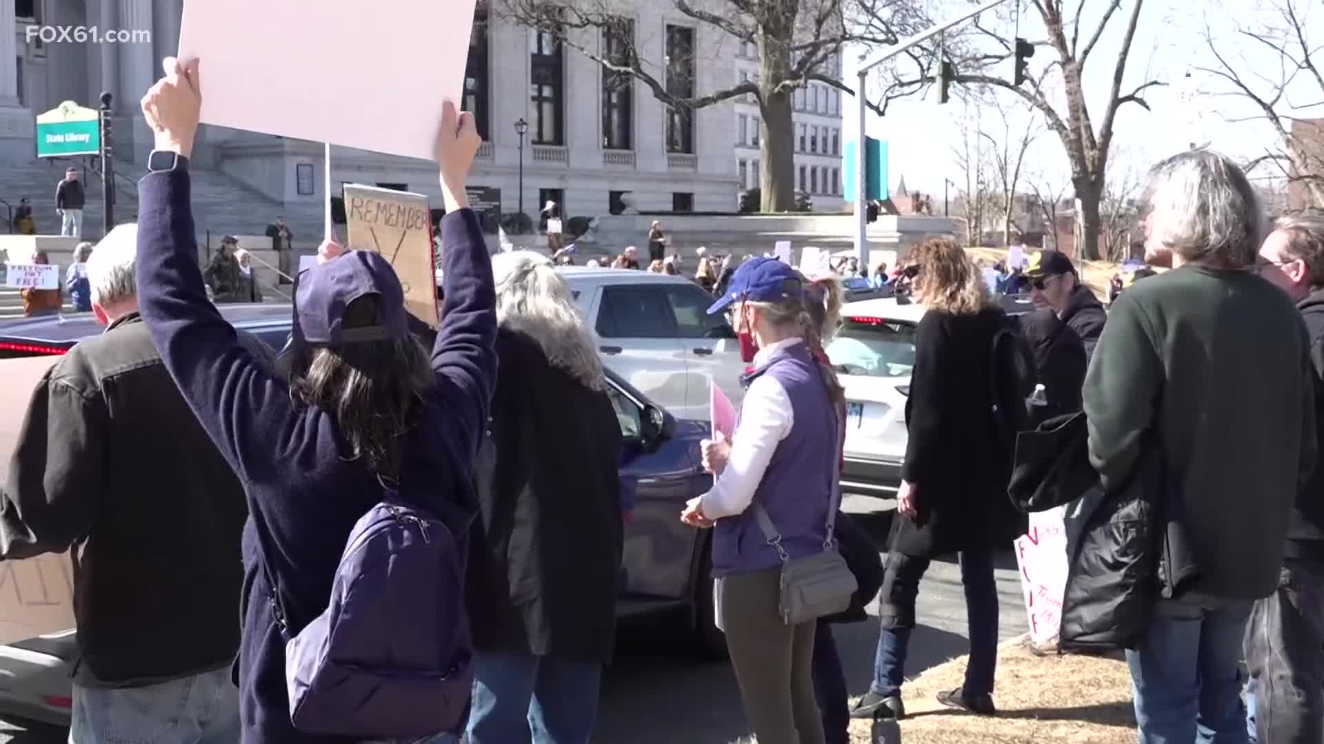 Advocates for US veterans in Hartford protest President Donald Trump's ...