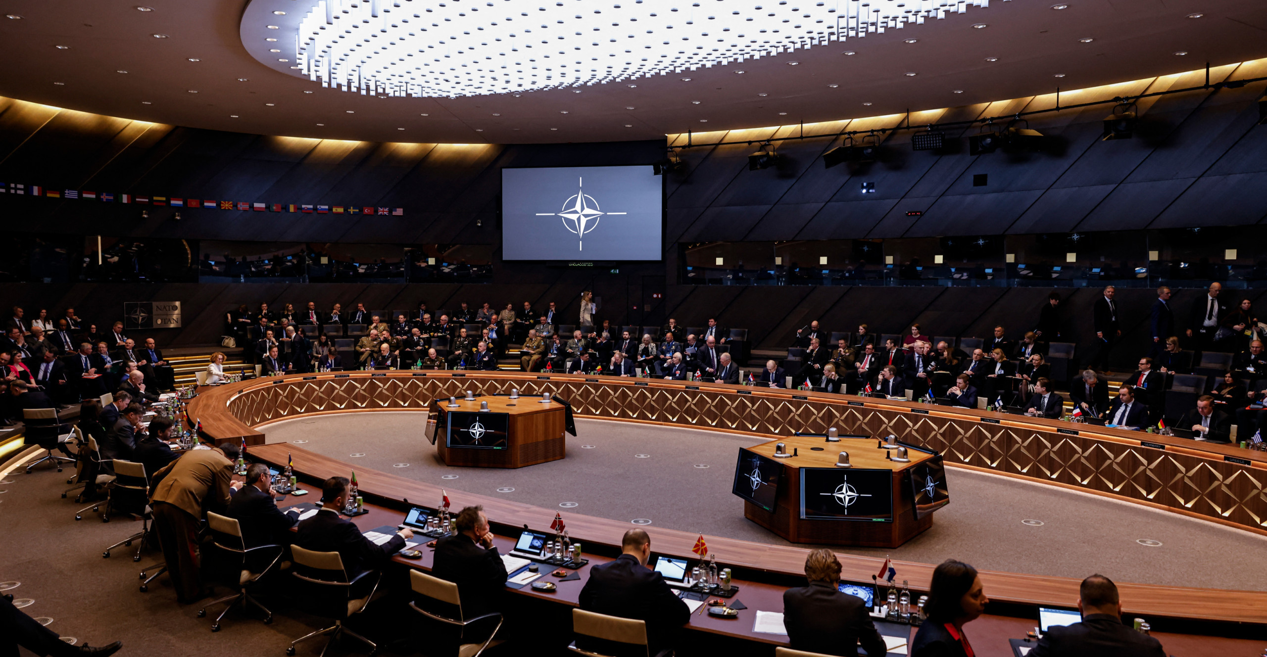 How much do NATO member states spend on defense?