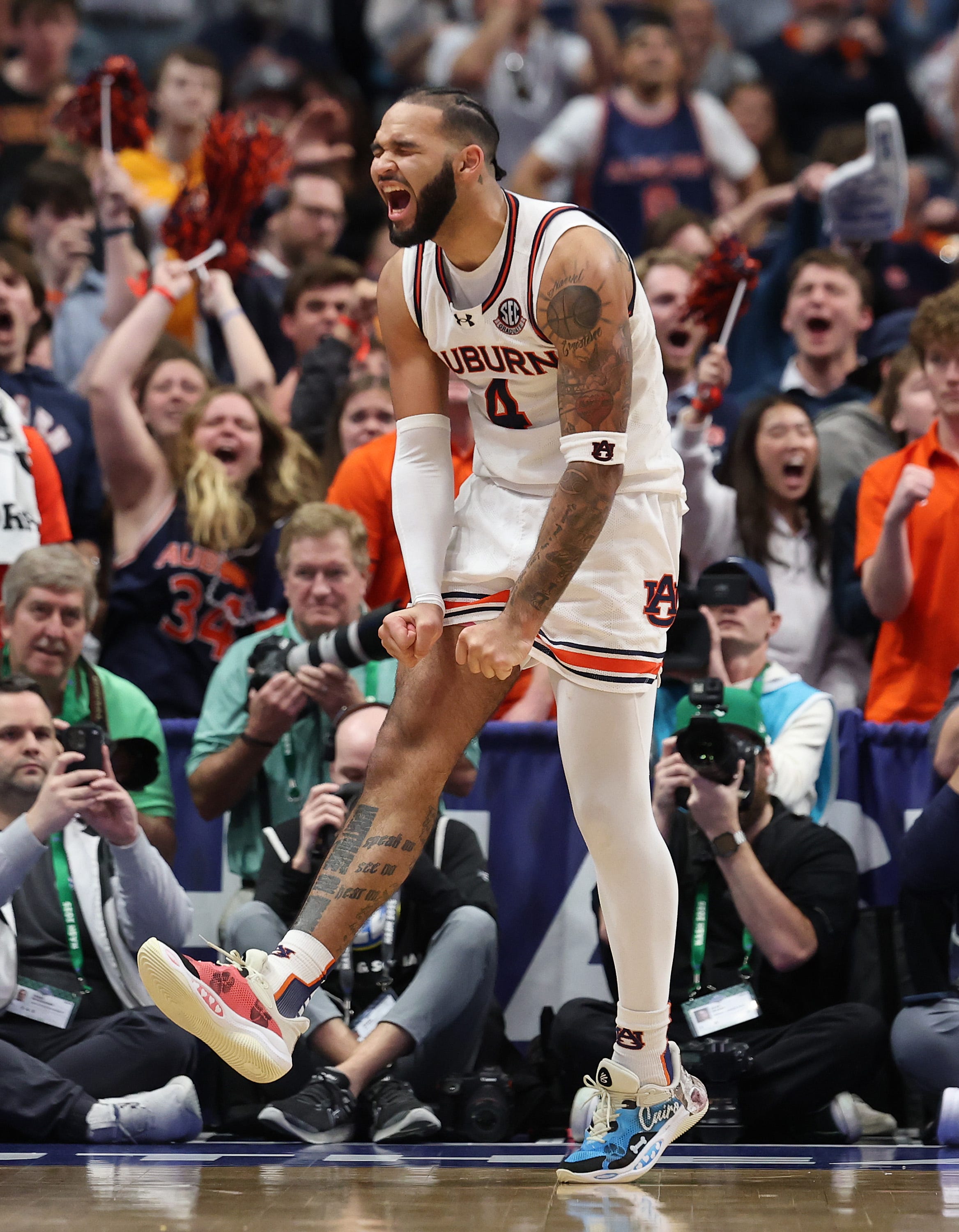 Tigers suppress rebellion, hold off Ole Miss 62-57 to reach SEC Semis