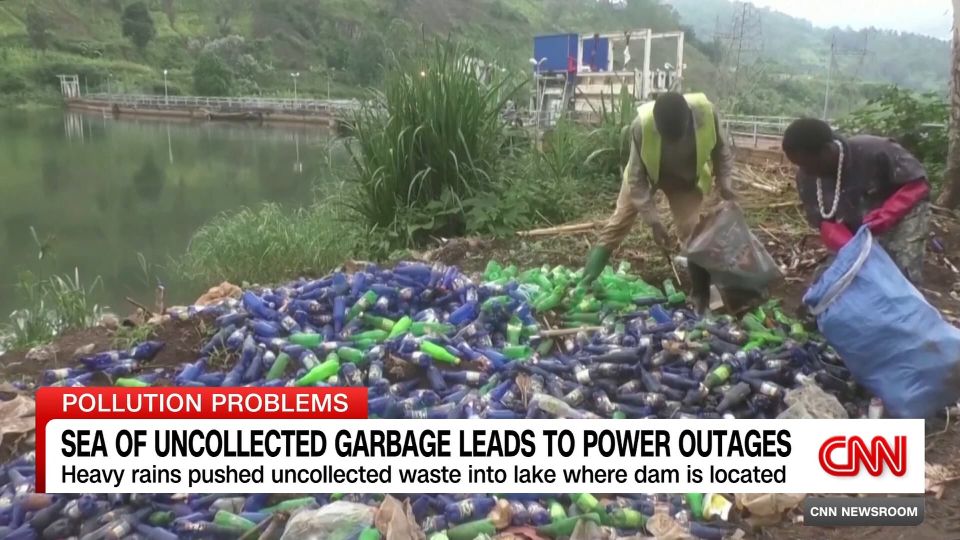 Trash clogs dam that provides electricity in the Democratic Republic of ...