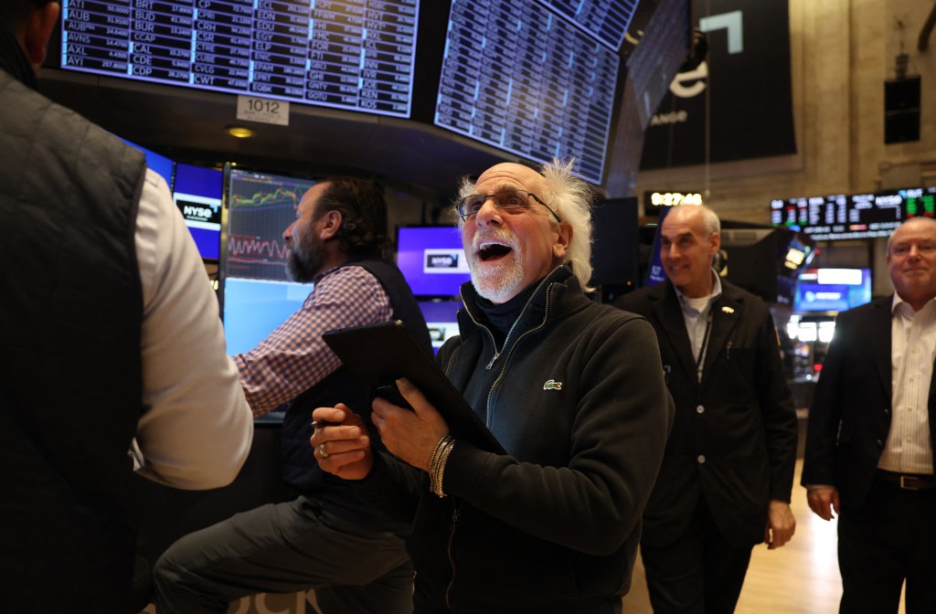 Dow surges over 650 points to cap off chaotic week sparked by Trump ...