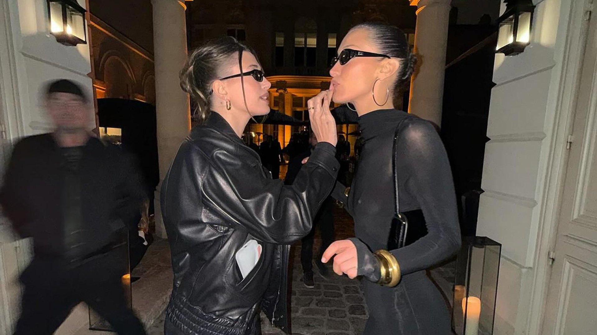 Hailey Bieber Sweetly Touches Up BFF Bella Hadid's Glam in Paris