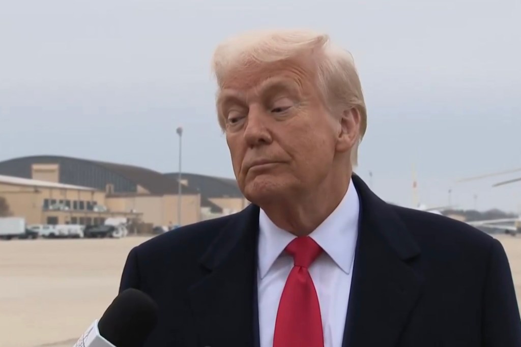 Trump stares down reporter after being hit in the face with a boom mic ...