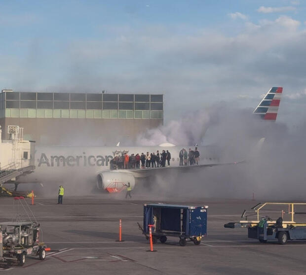 12 passengers rushed to hospital after American Airlines plane catches ...