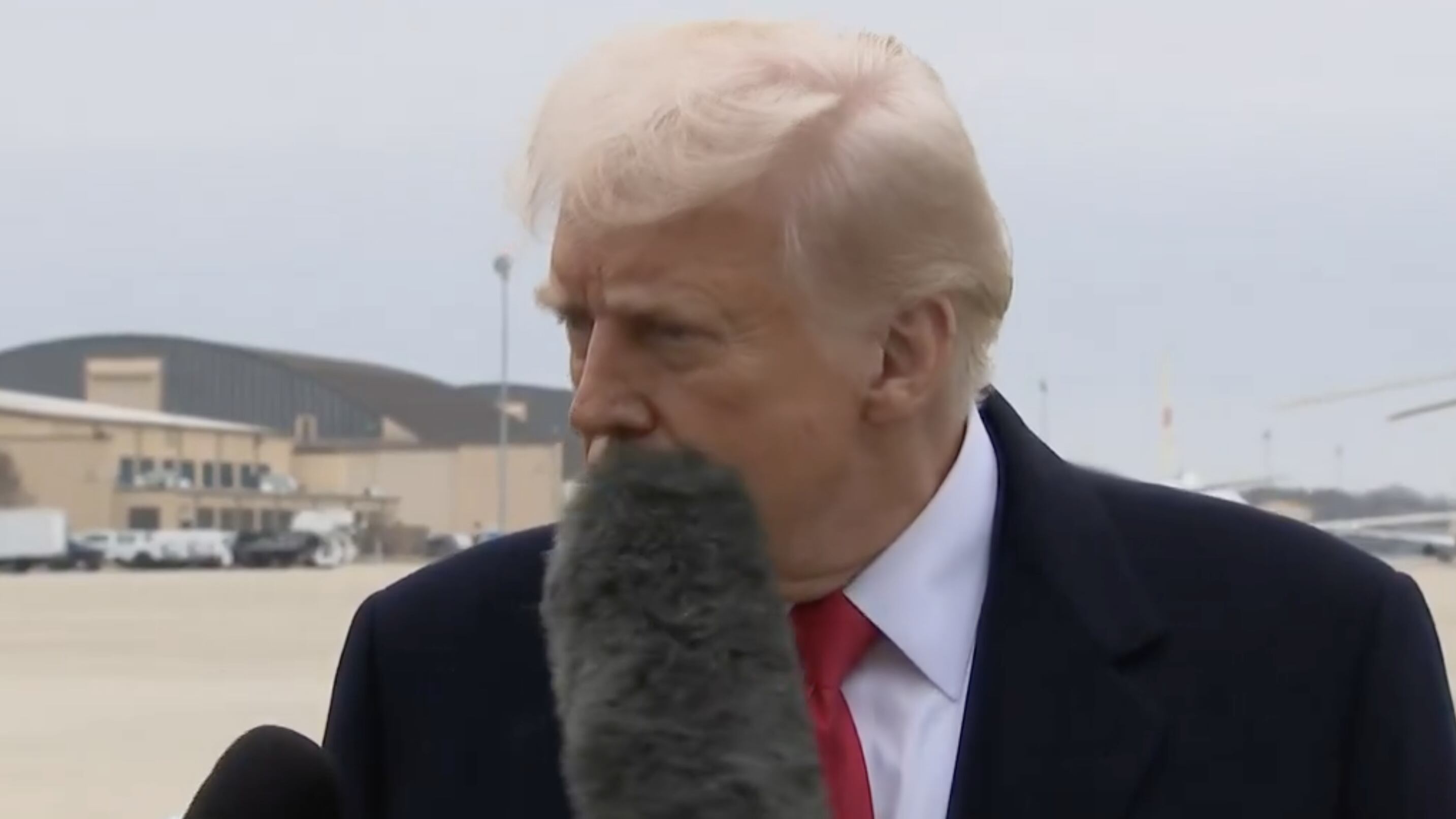 Trump Takes a Boom Mic to the Face