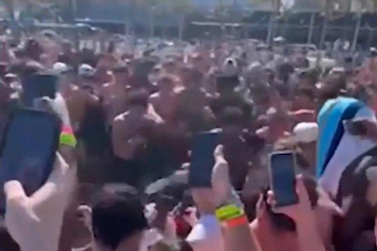 Spring Break brawl erupts on controversial beach as students rush to ...