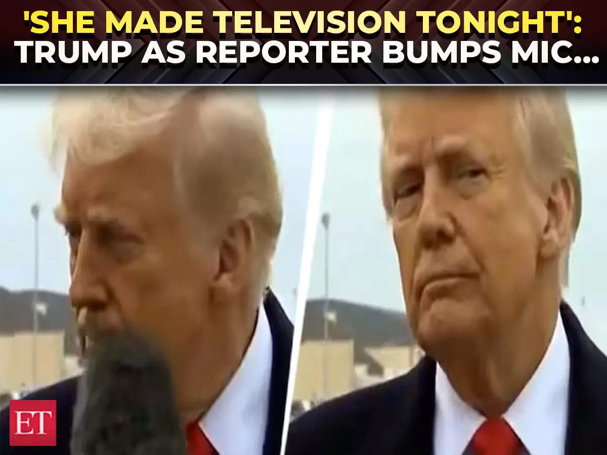 Trump's stares down reporter after being hit in the face with a boom ...