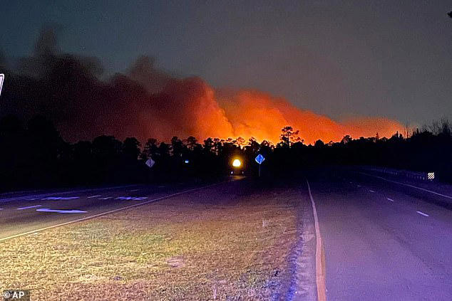 Americans evacuated as 175 wildfires rip through two states